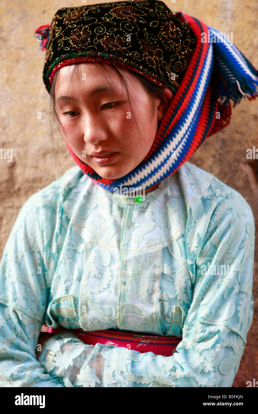 White Hmong tribeswoman at the market at Dong Van, Ha Giang Province ...