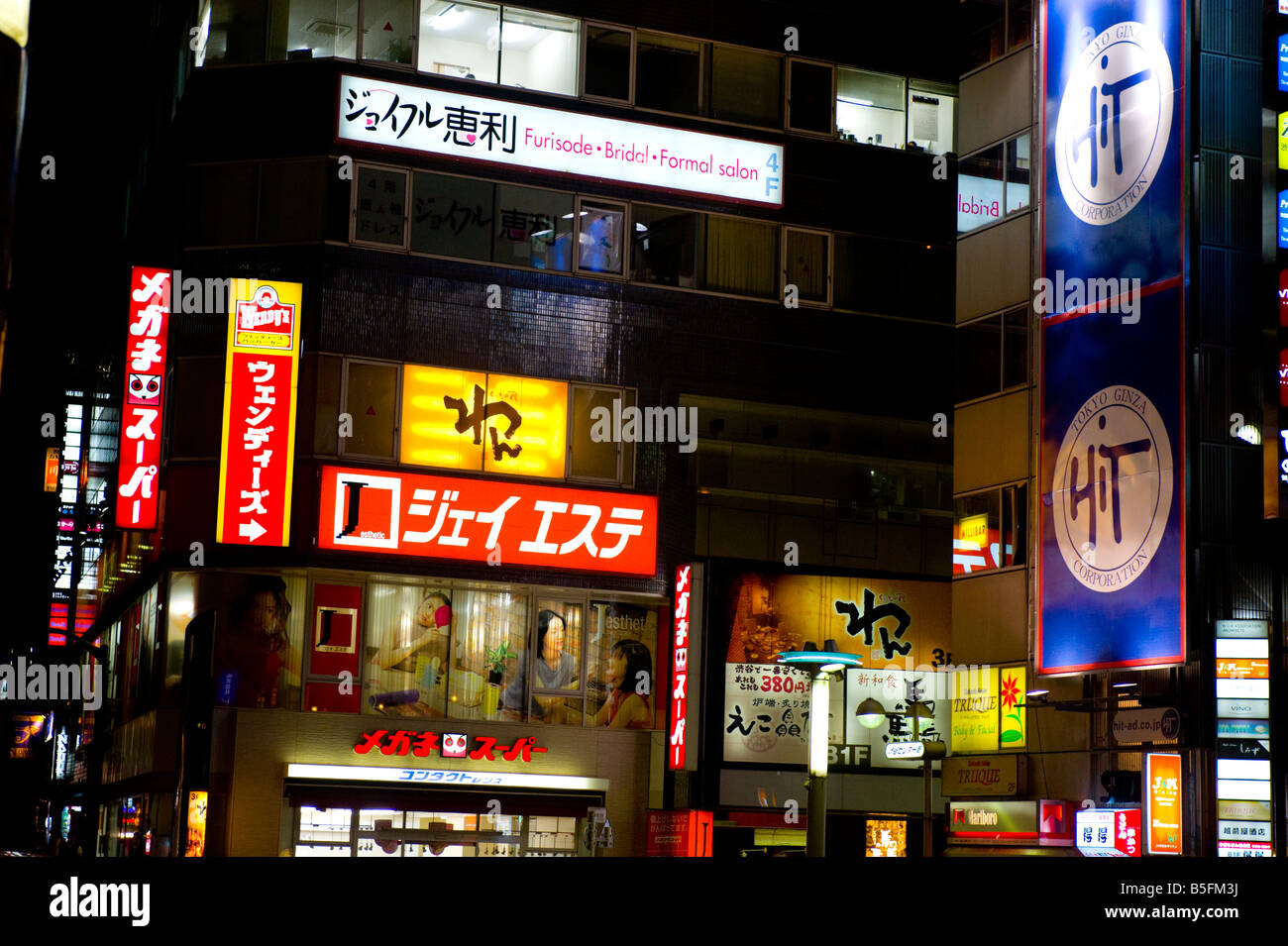 Neon lights in the streets of Shibuya, Tokyo, Japan Stock Photo - Alamy