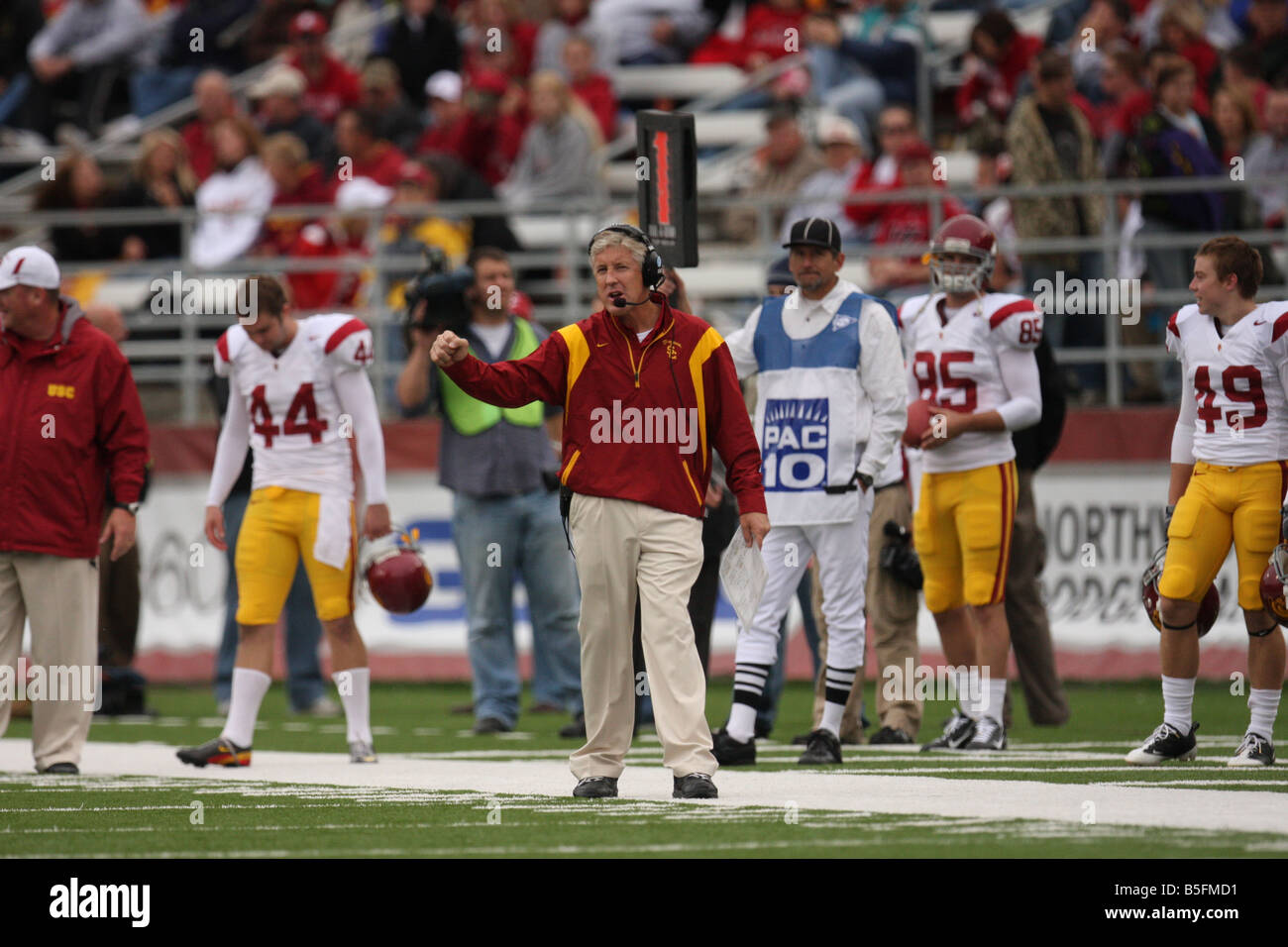 Southern Cal head football coach, Pete Carroll, patrols the sidelines ...