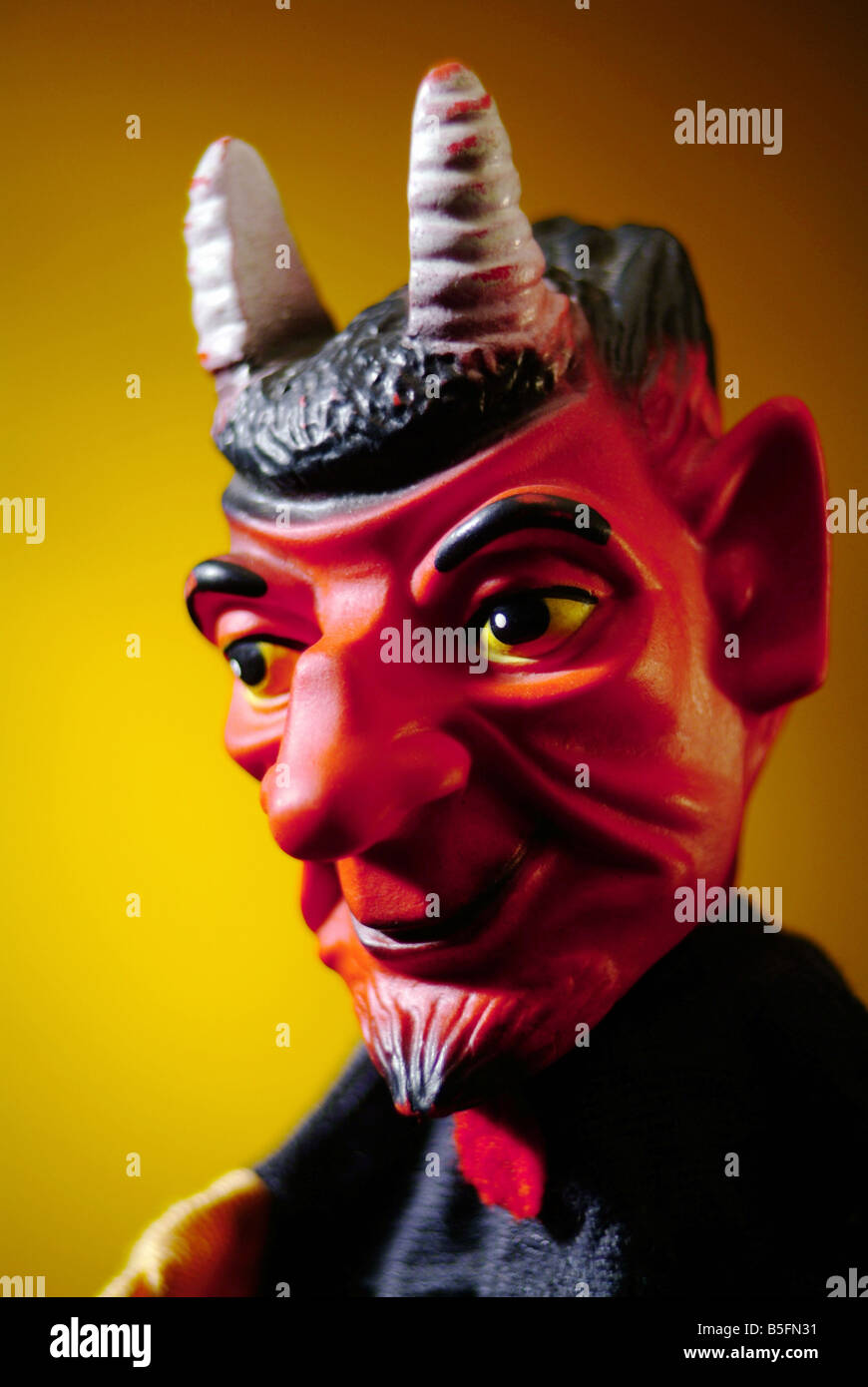 A devil hand puppet Stock Photo - Alamy