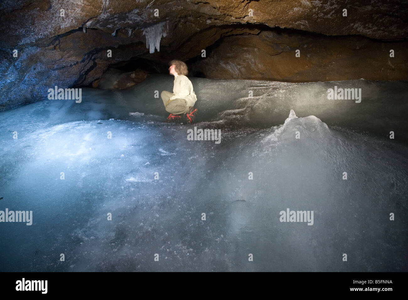 Woman standing inside the Grotta del Gelo, Etna volcano Stock Photo - Alamy