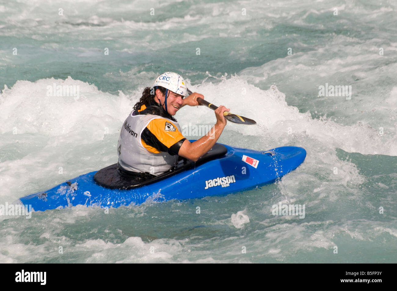 Competitor in whitewater kayaking competition Stock Photo - Alamy