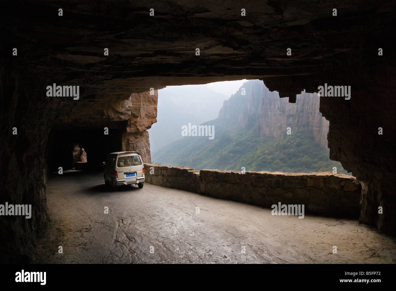 Road chiseled out from the cliff Mt Taihang near Huixian Henan Province ...