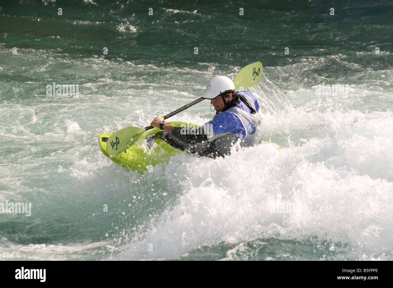 Competitor in whitewater kayaking competition Stock Photo - Alamy