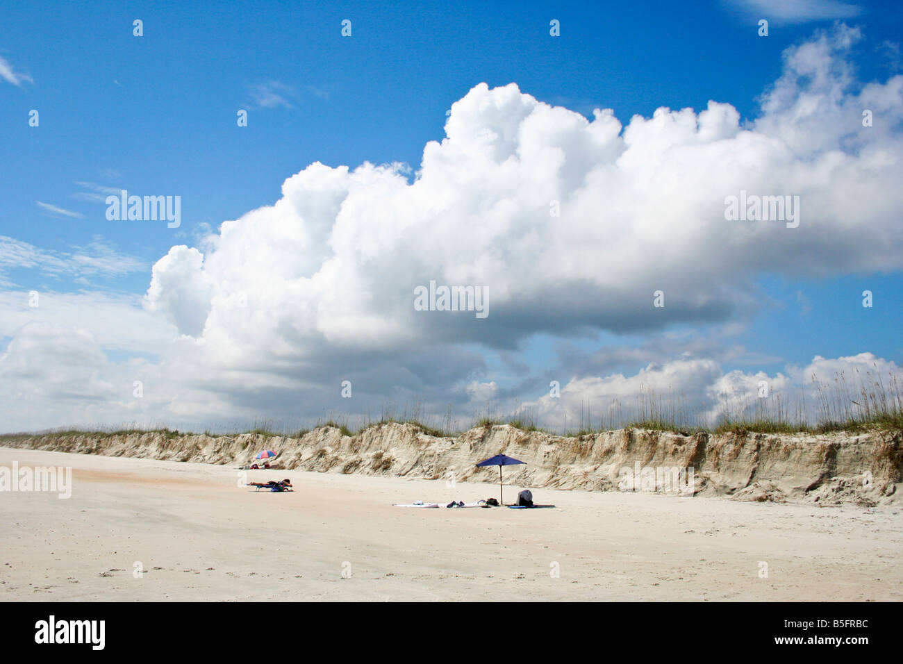 A lone bather relaxes at Huntington Beach, South Carolina on a sunny ...
