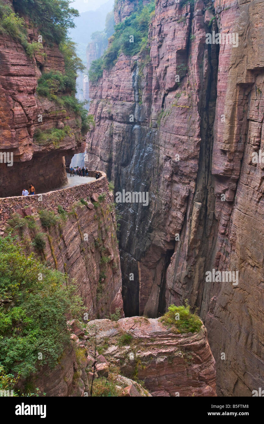 Road chiseled out from the cliff Mt Taihang near Huixian Henan Province ...
