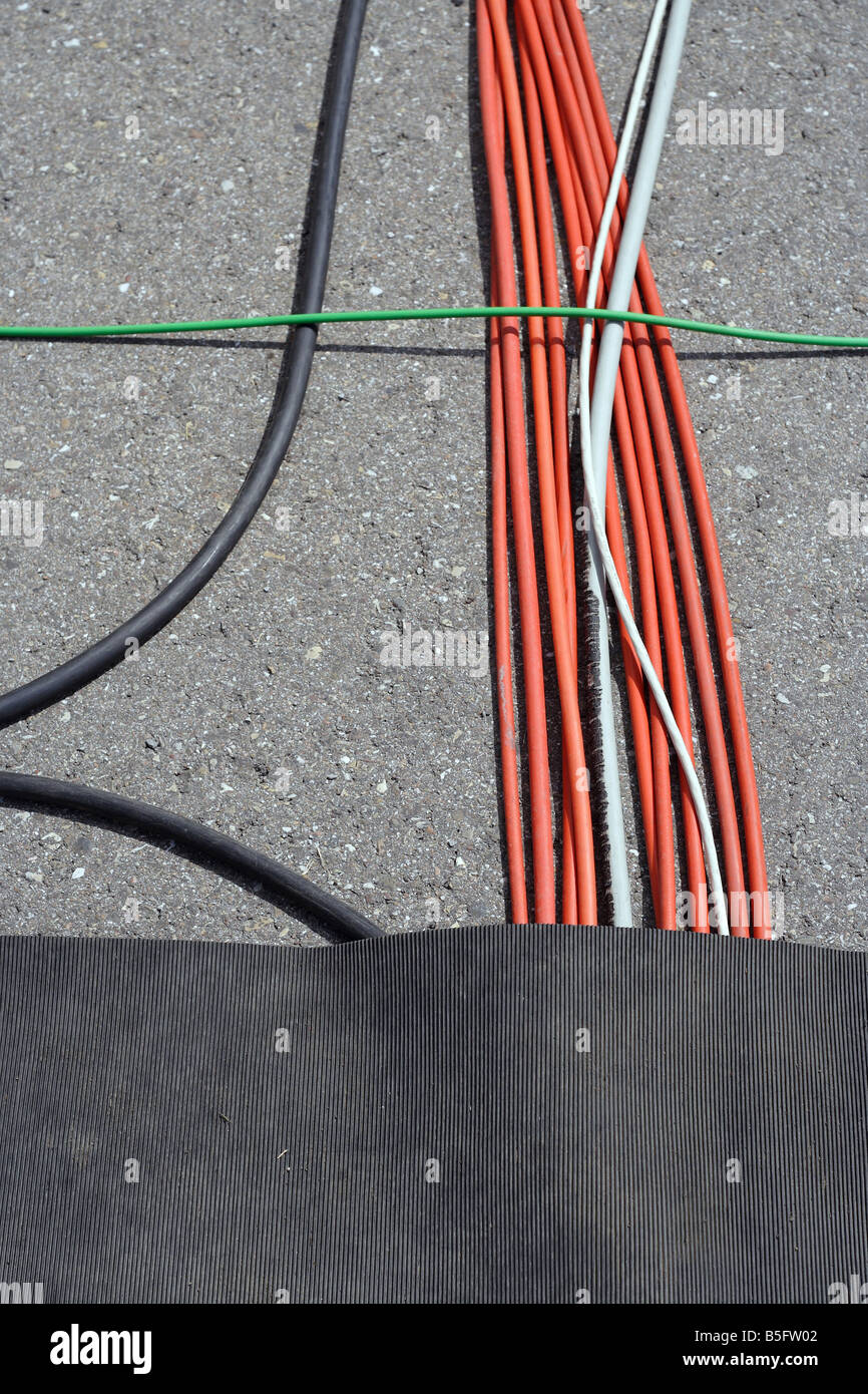 Cables running under a cable bridge Stock Photo - Alamy