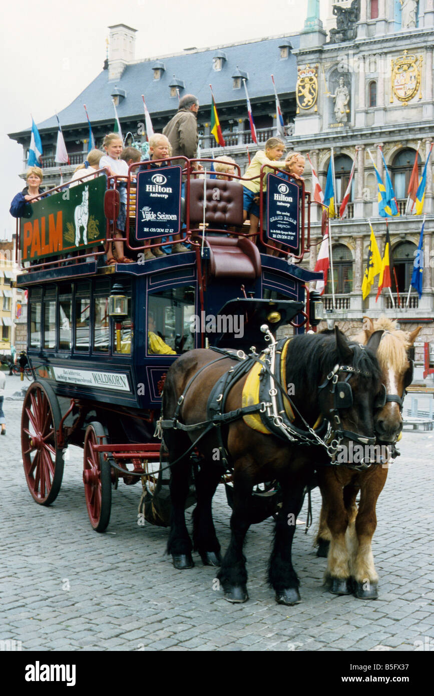 Horse-drawn double-decker bus in Grote Markt Stock Photo - Alamy