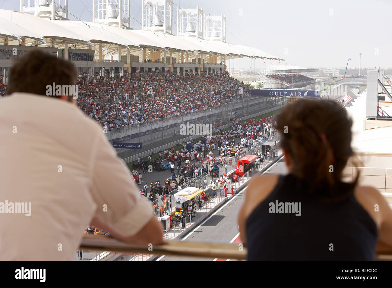 Spectators watch the start of the 2007 Bahrain F1 Formula 1 one Grand ...