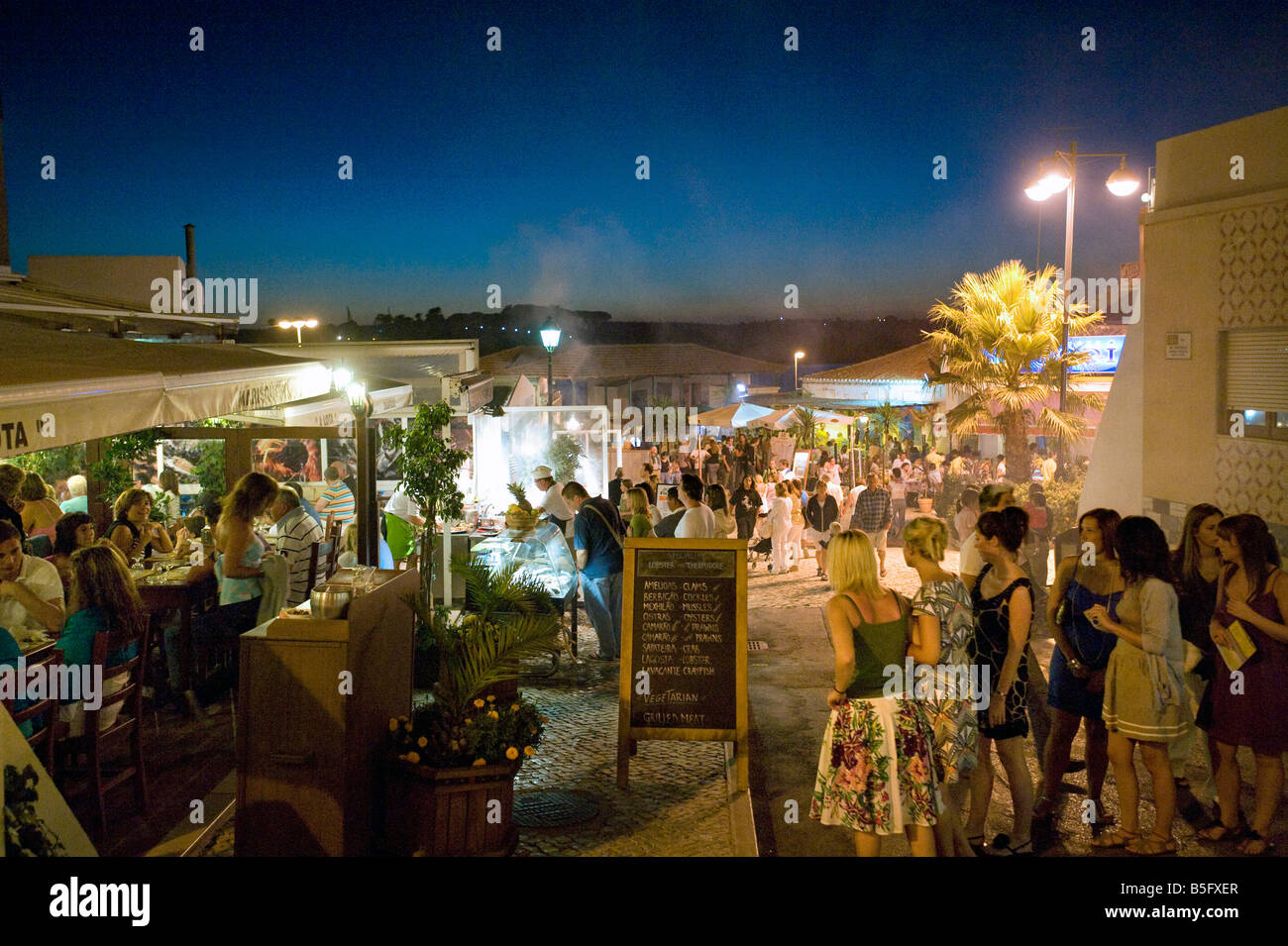 Street scene in Alvor at Dusk , Algarve , Portugal Stock Photo - Alamy