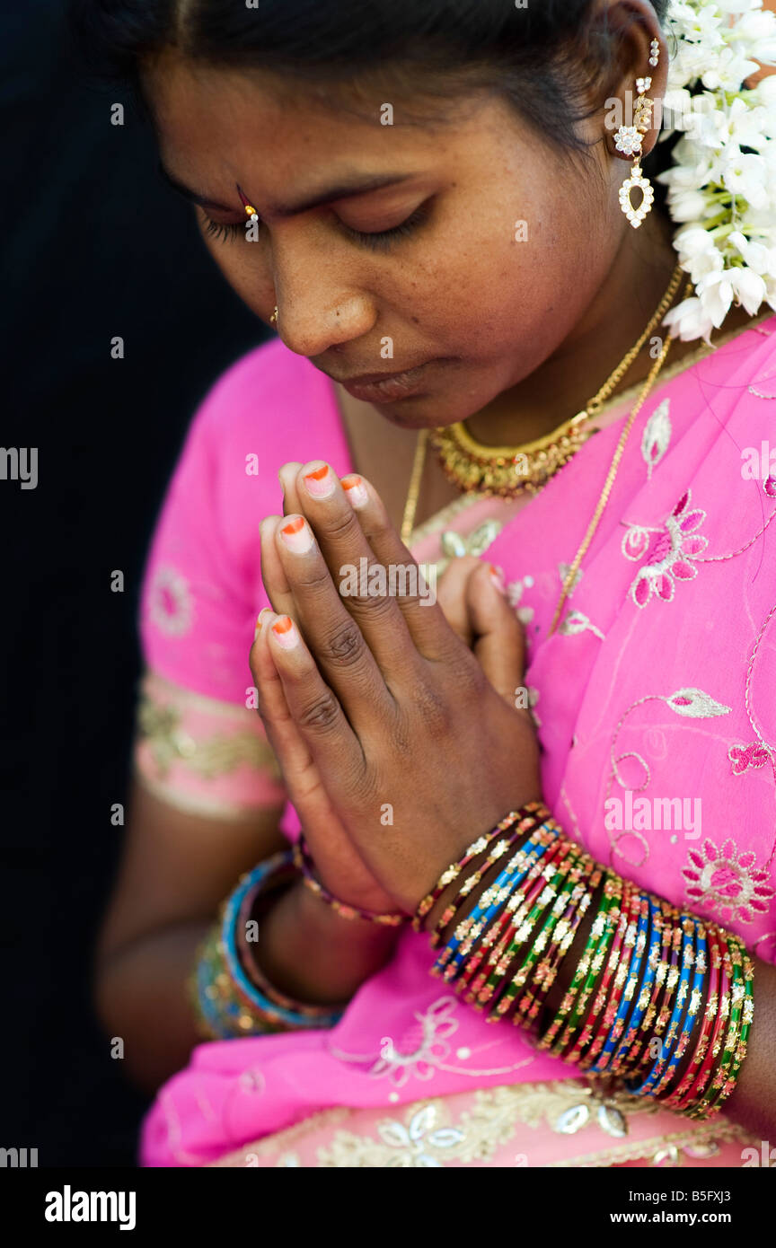 Indian girl wearing pink sari with prayer hands. India Stock Photo - Alamy