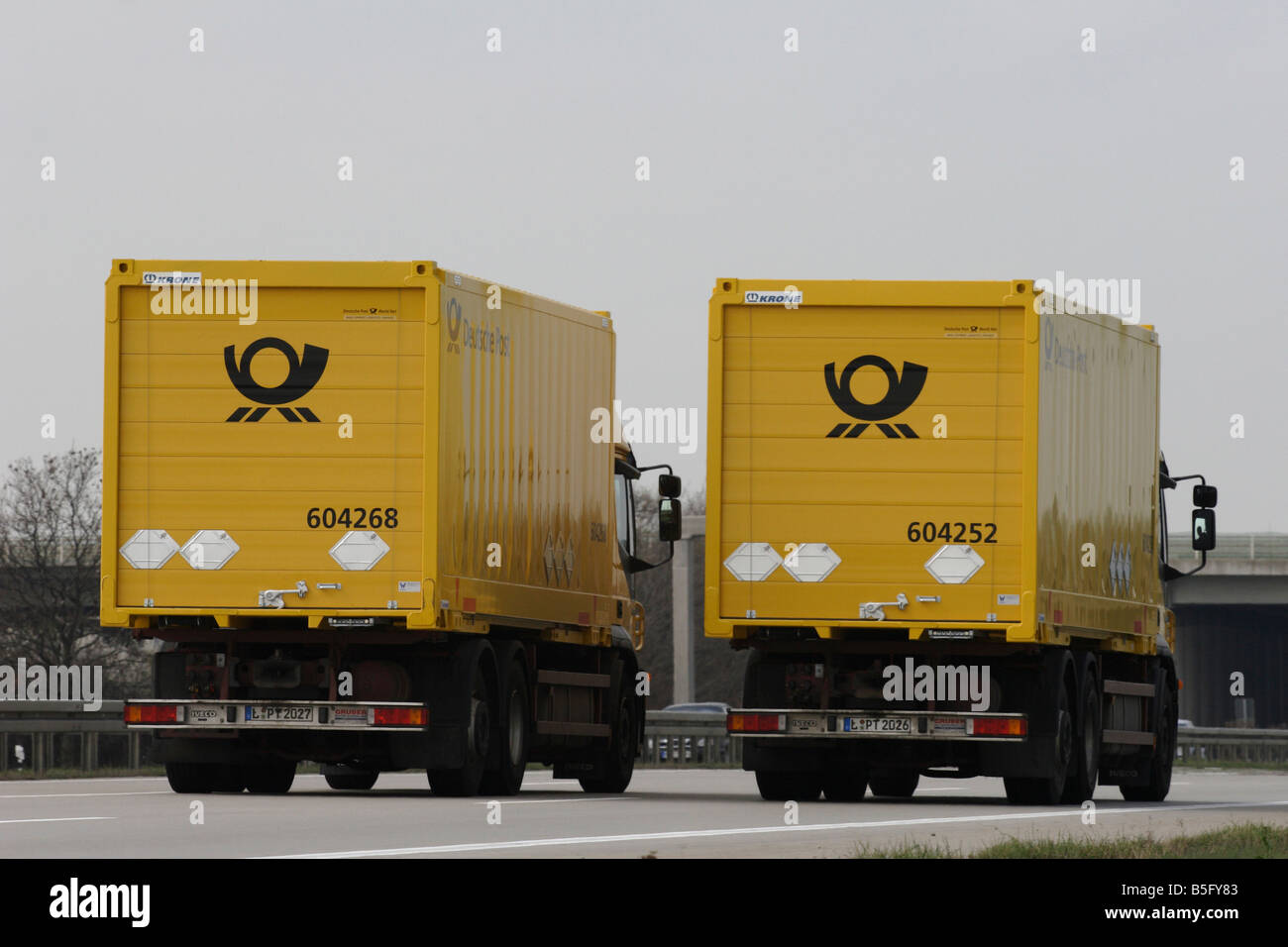 Two lorries of the German Post on the highway in Schkeuditz, Germany ...