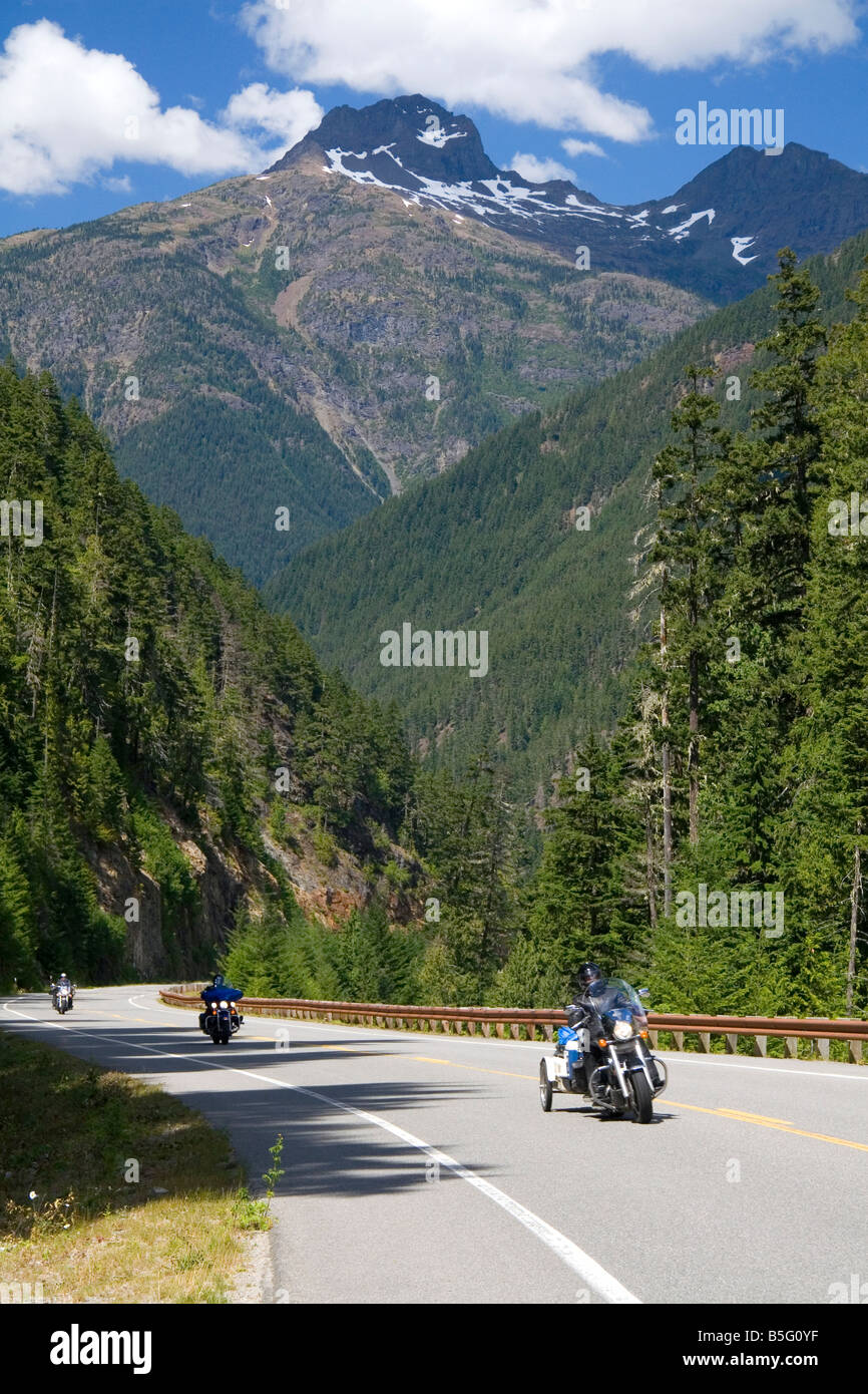 Motorcycles travel on Washington State Highway 20 in the North Cascade ...