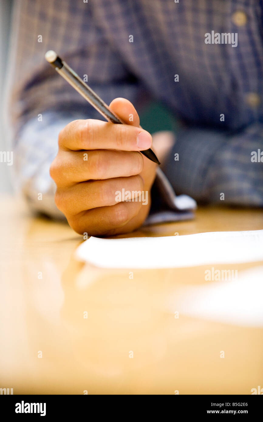 detail of male hand holding pen Stock Photo - Alamy