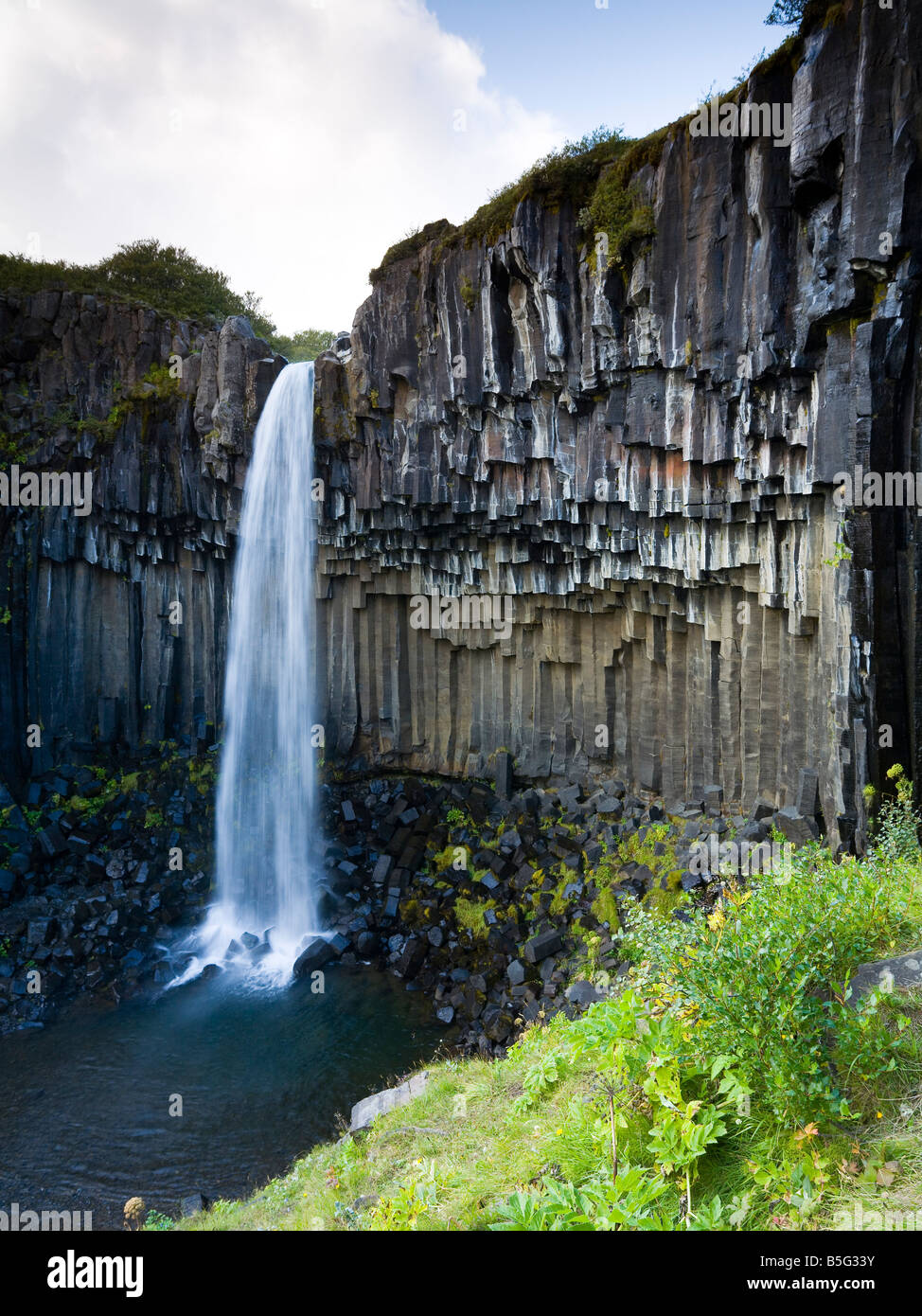Rock strata formations at Svartifoss waterfall Skaftafell National Park ...