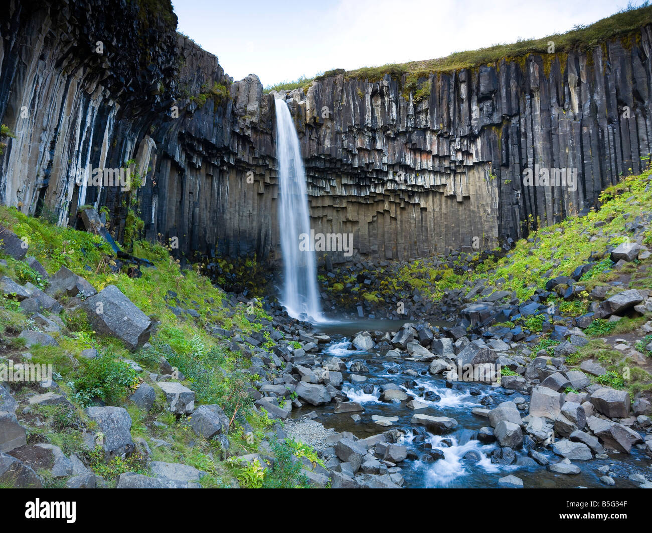 Rock strata formations at Svartifoss waterfall Skaftafell National Park ...