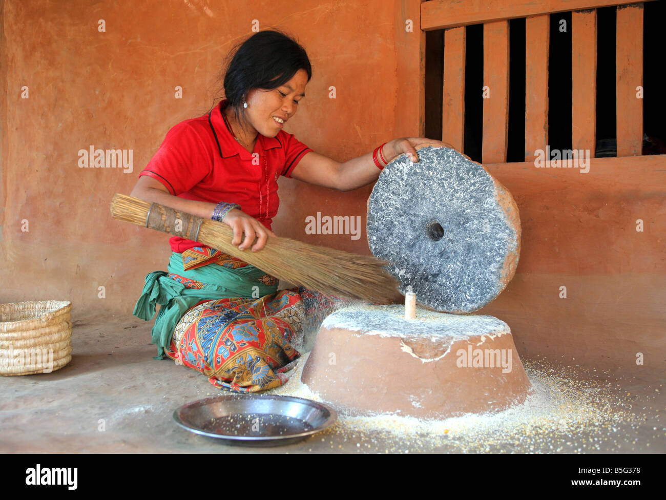 Stone grain grinder High Resolution Stock Photography and Images - Alamy