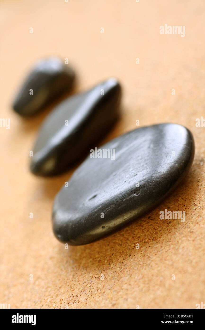 three stones in row Stock Photo - Alamy