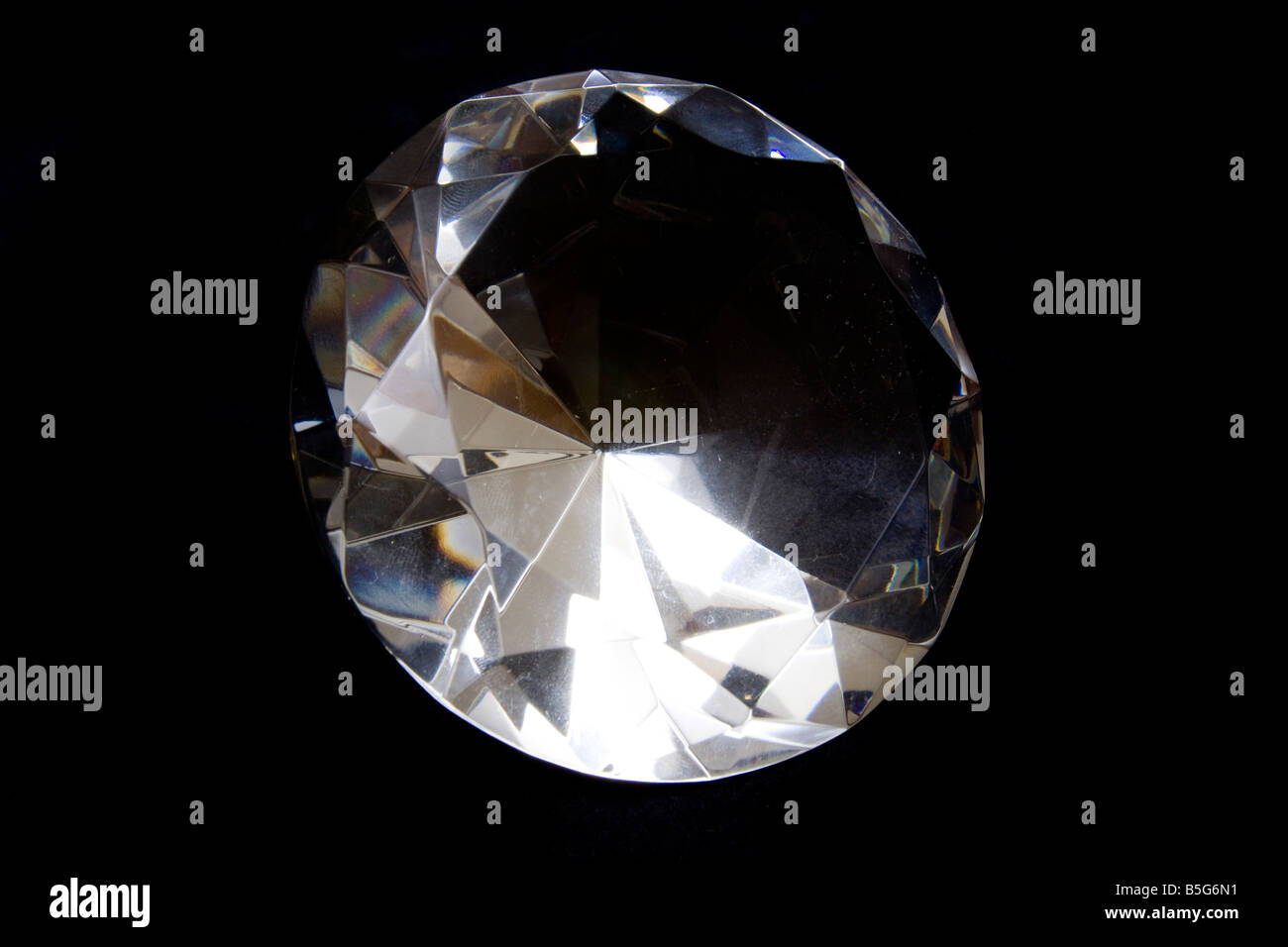 Diamond isolated on a black studio background Stock Photo - Alamy