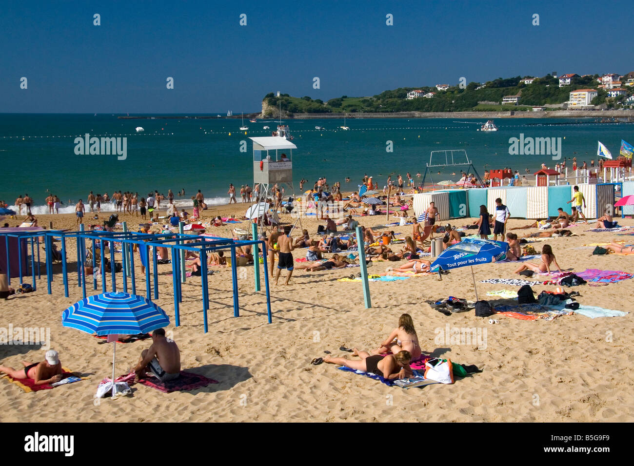 Beach scene in the bay at Saint Jean de Luz Pyrenees Atlantiques French ...