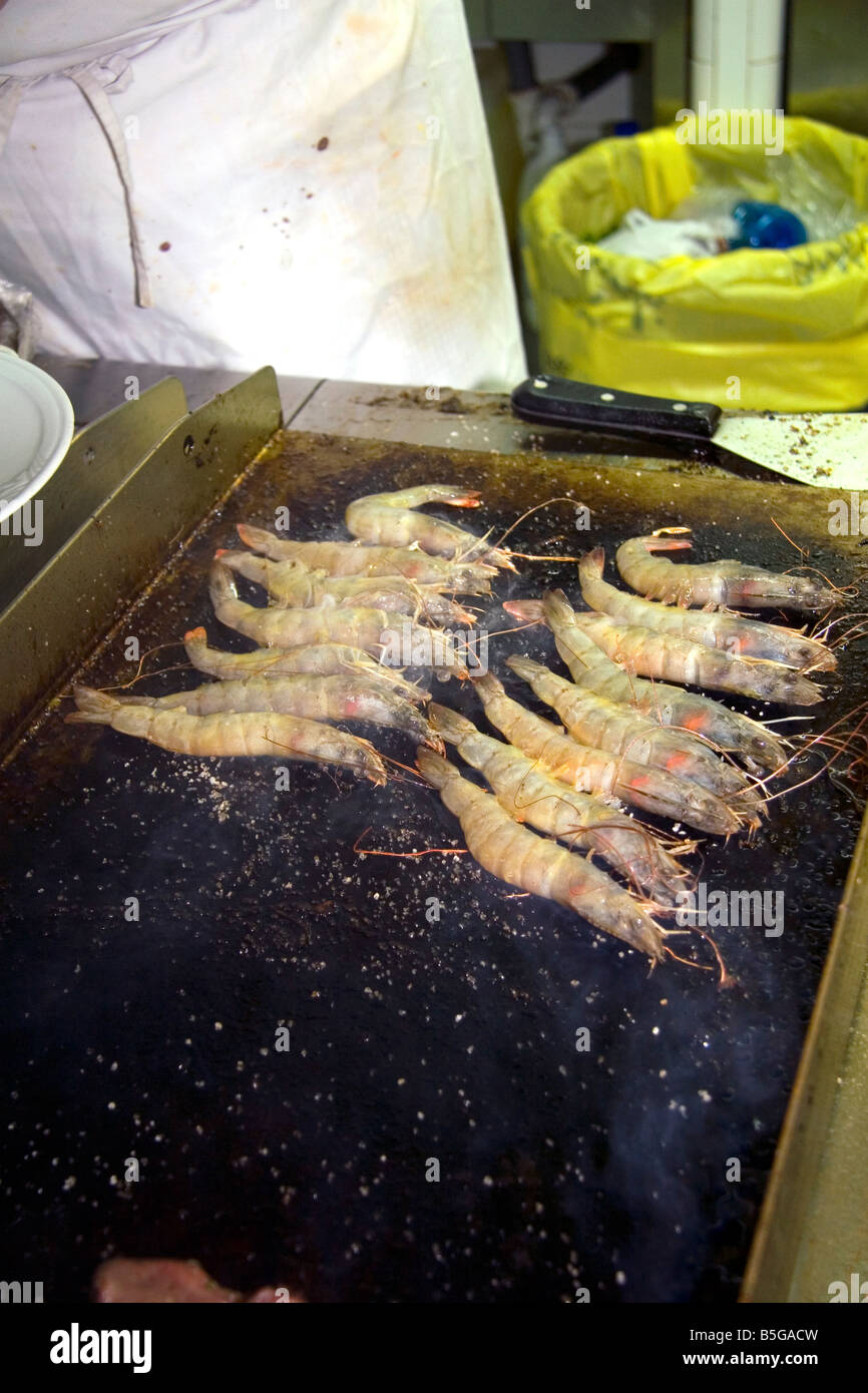 Whole shrimp being cooked at a basque restaurant in the city of Bilbao ...