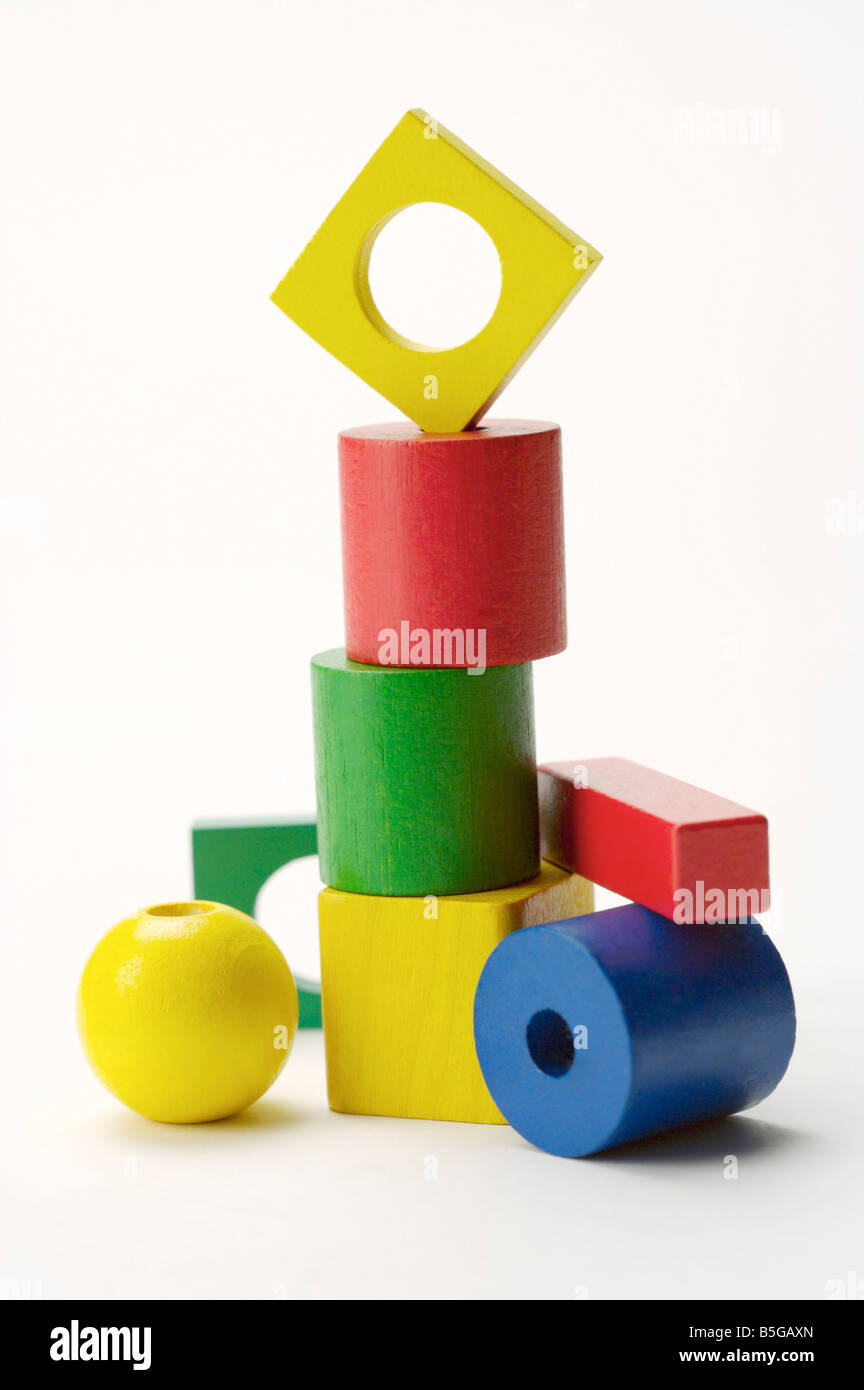 Wooden toy blocks, stacked Stock Photo - Alamy