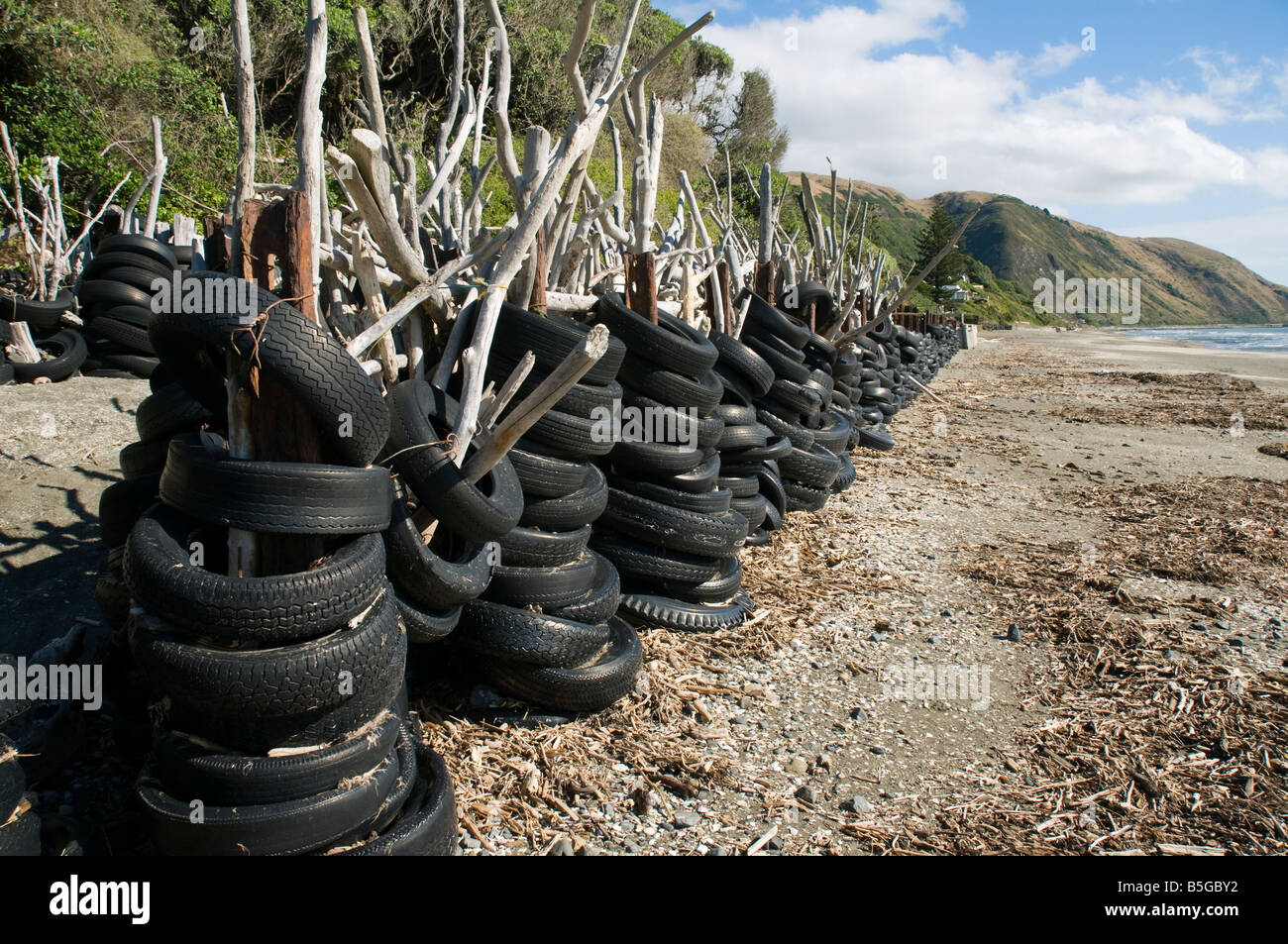 Old tyres being used for sea defences, Paekakariki Beach, North Island ...