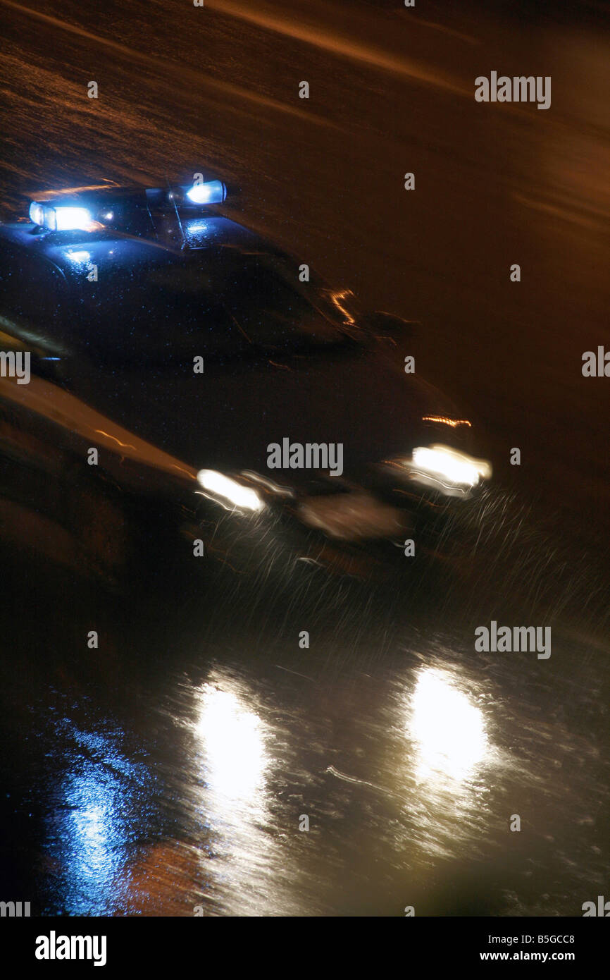 Driving in rain police lights hi-res stock photography and images - Alamy