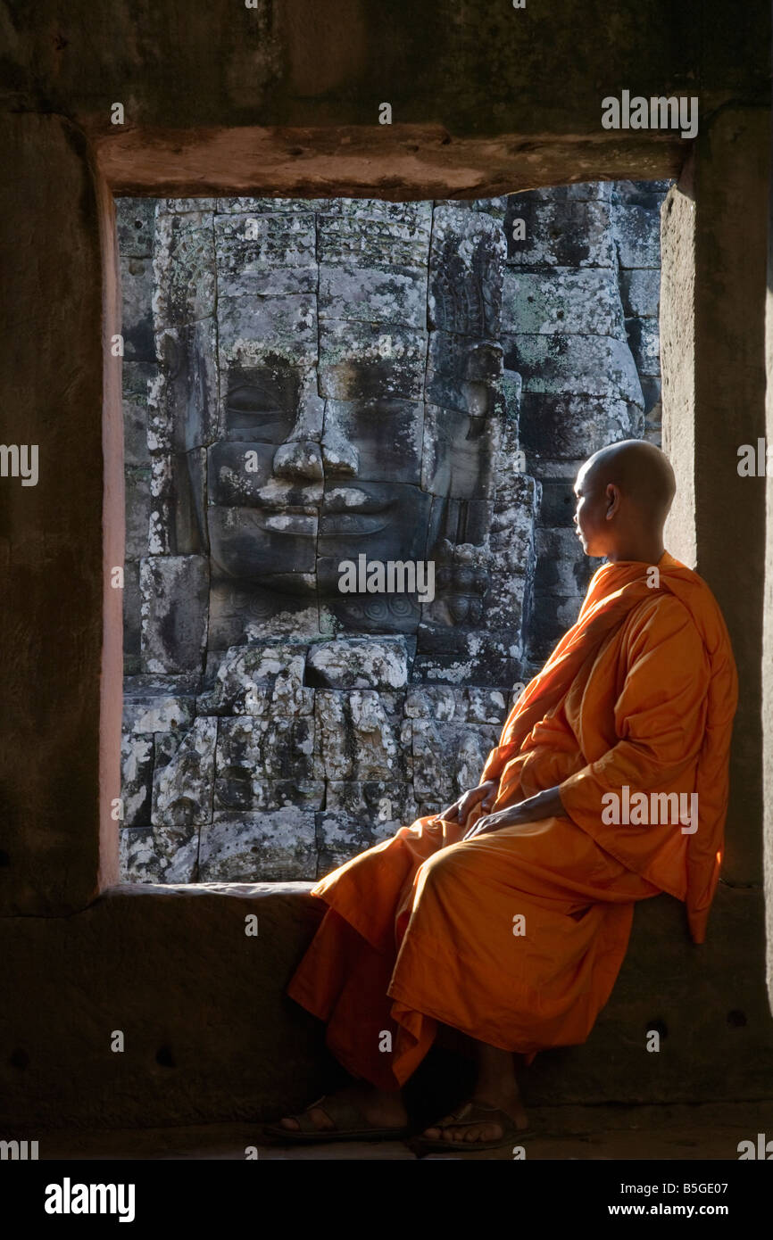 Monk with huge smiling face at Bayon Temple Angkor Thom Cambodia Stock ...