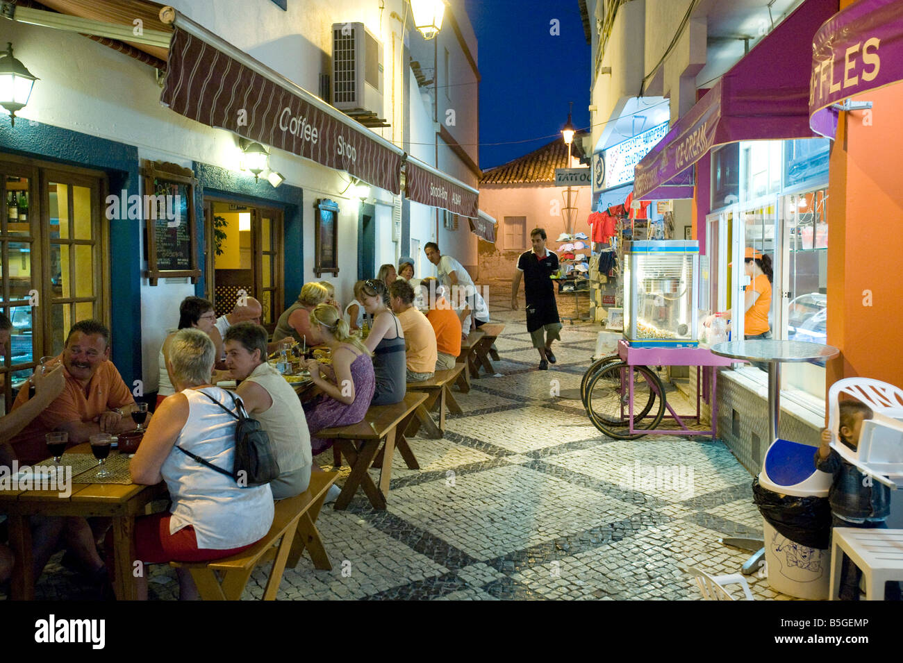 Street scene in Alvor at Dusk , Algarve , Portugal Stock Photo - Alamy
