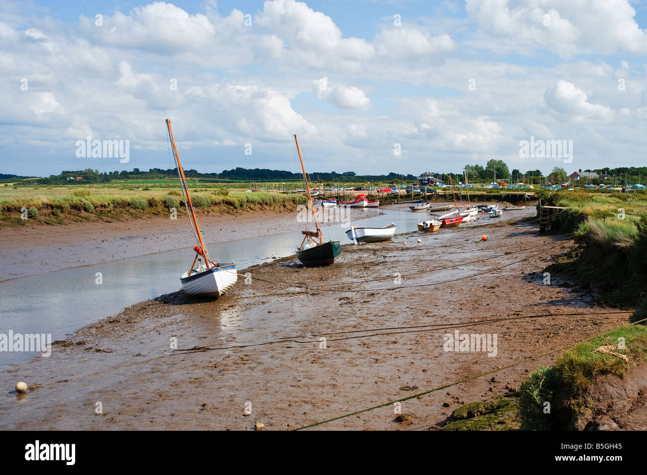 Boats at rest, low tide at "Morston Quay" North Norfolk, UK Stock Photo ...