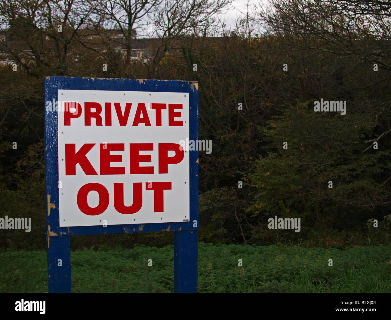 a " private keep out" sign on land in cheshire,england Stock Photo - Alamy