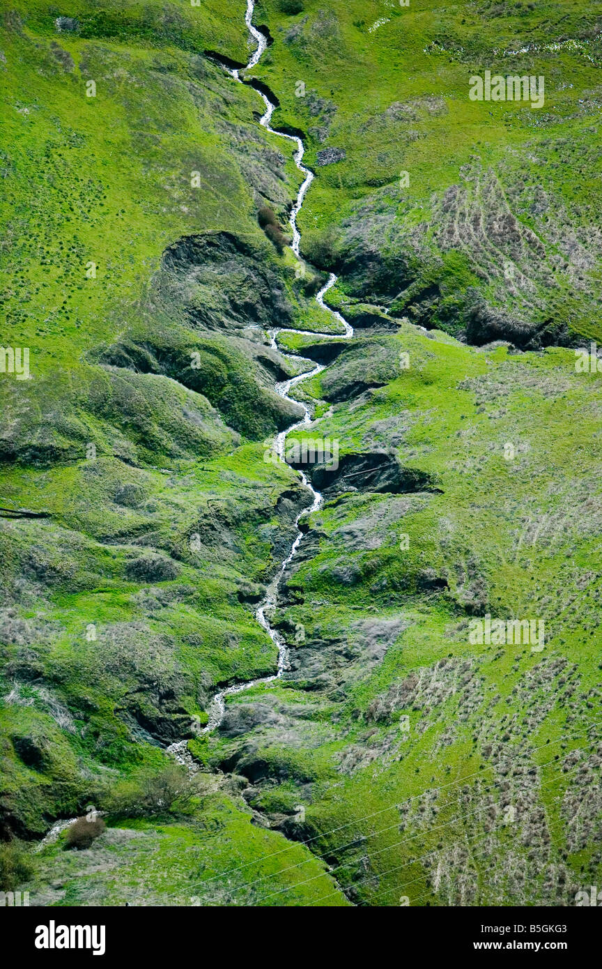 aerial view above meandering Adobe creek descending from Sonoma ...