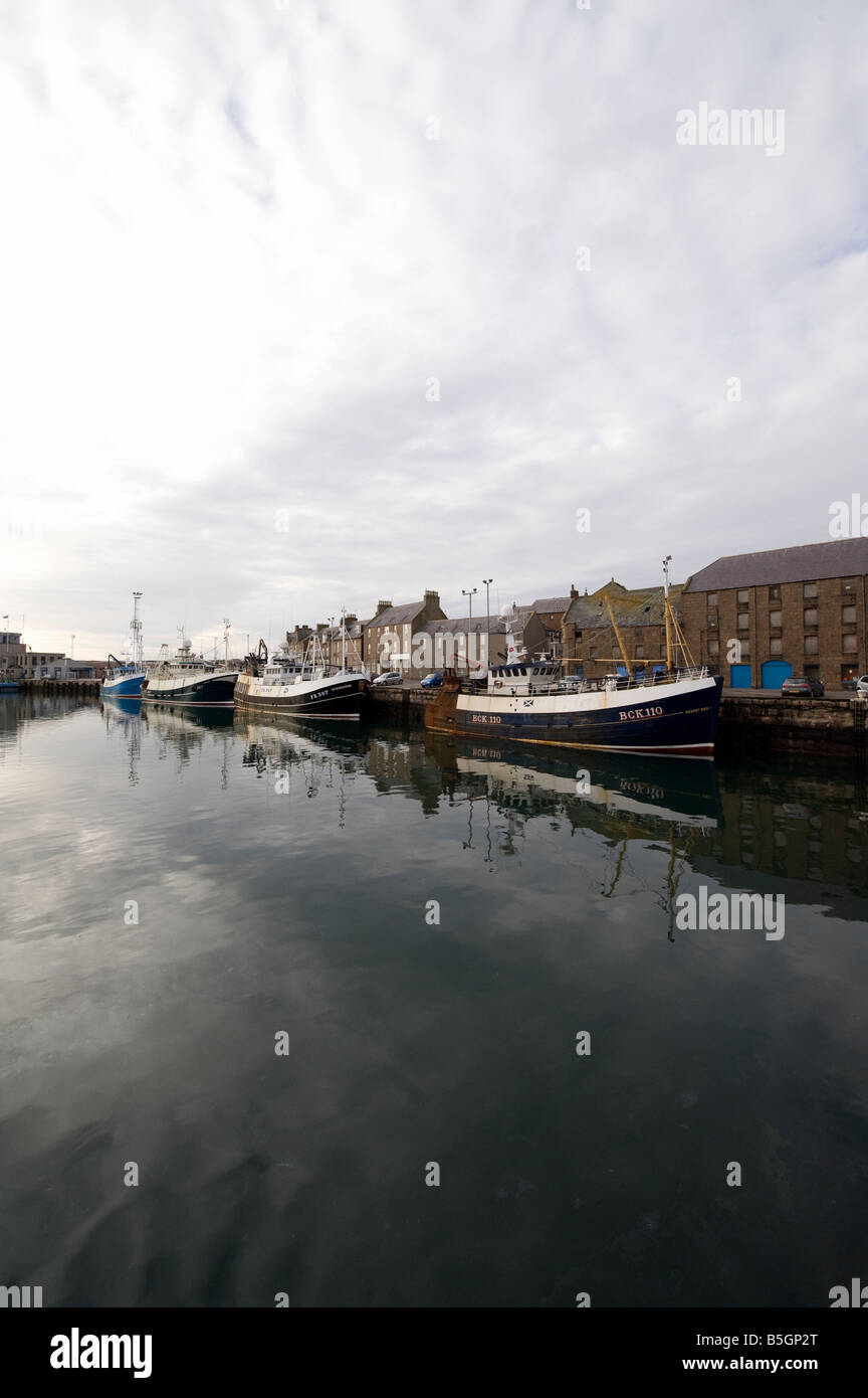Fishing boats moored at the port of Peterhead, Aberdeenshire, Scotland ...