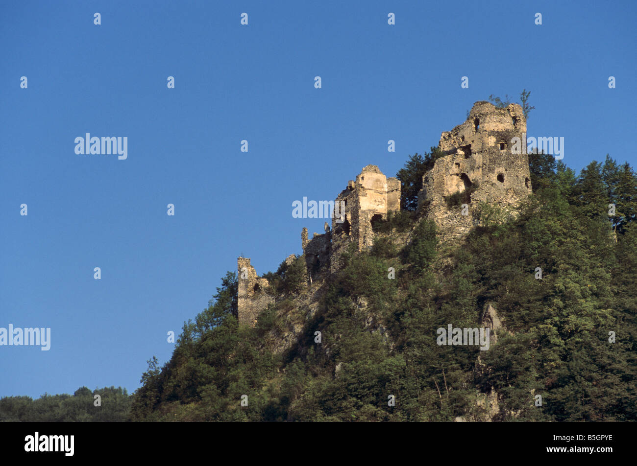 Starhrad Castle ruins on hill over village of Varin near town of Zilina ...
