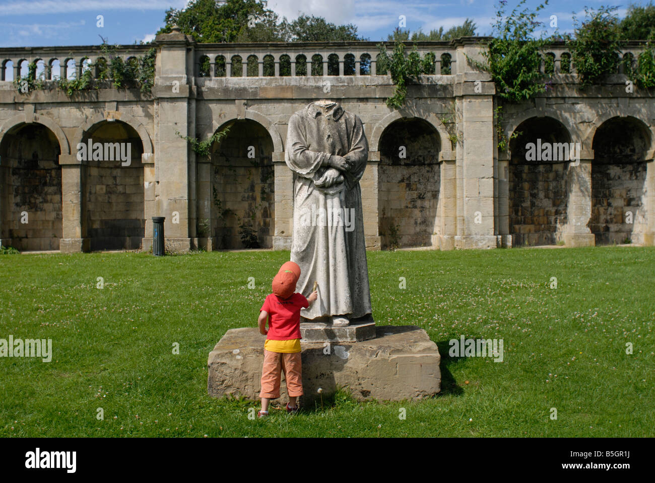 Child Touching Statue High Resolution Stock Photography and Images - Alamy