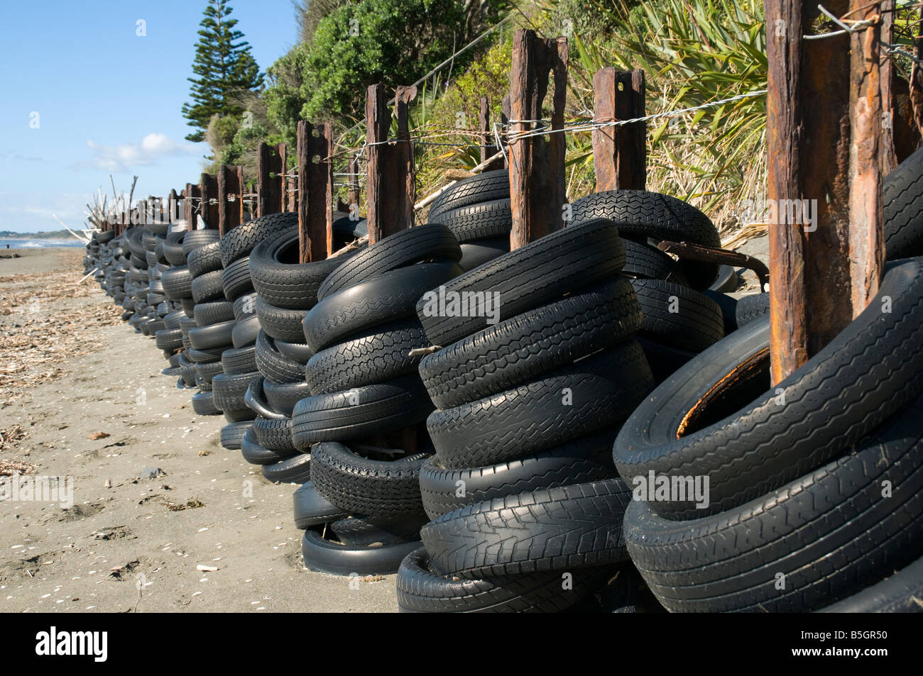 Old tyres being used for sea defences, Paekakariki Beach, North Island ...