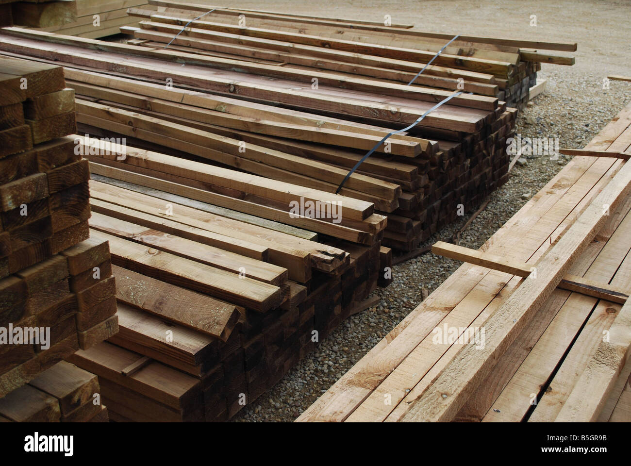 Stack of wood at a woodyard Stock Photo - Alamy