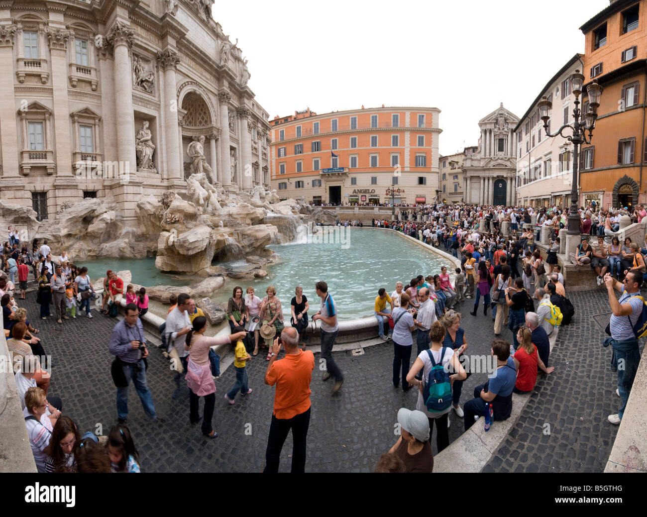Fontana di Trevi (Trevi Fountain) in Rome with crowd of tourists Stock ...