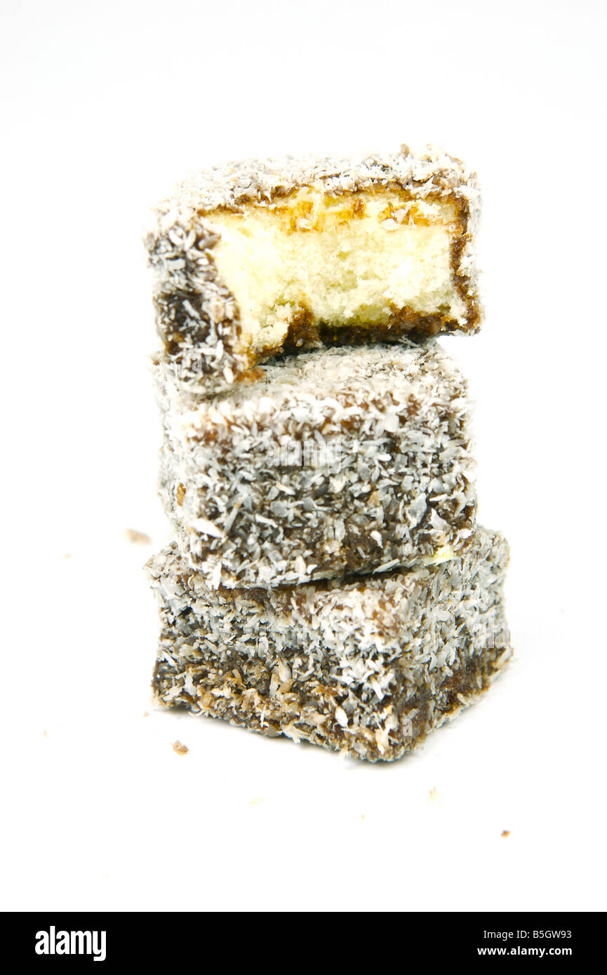 Lamingtons isolated against a white background Stock Photo - Alamy