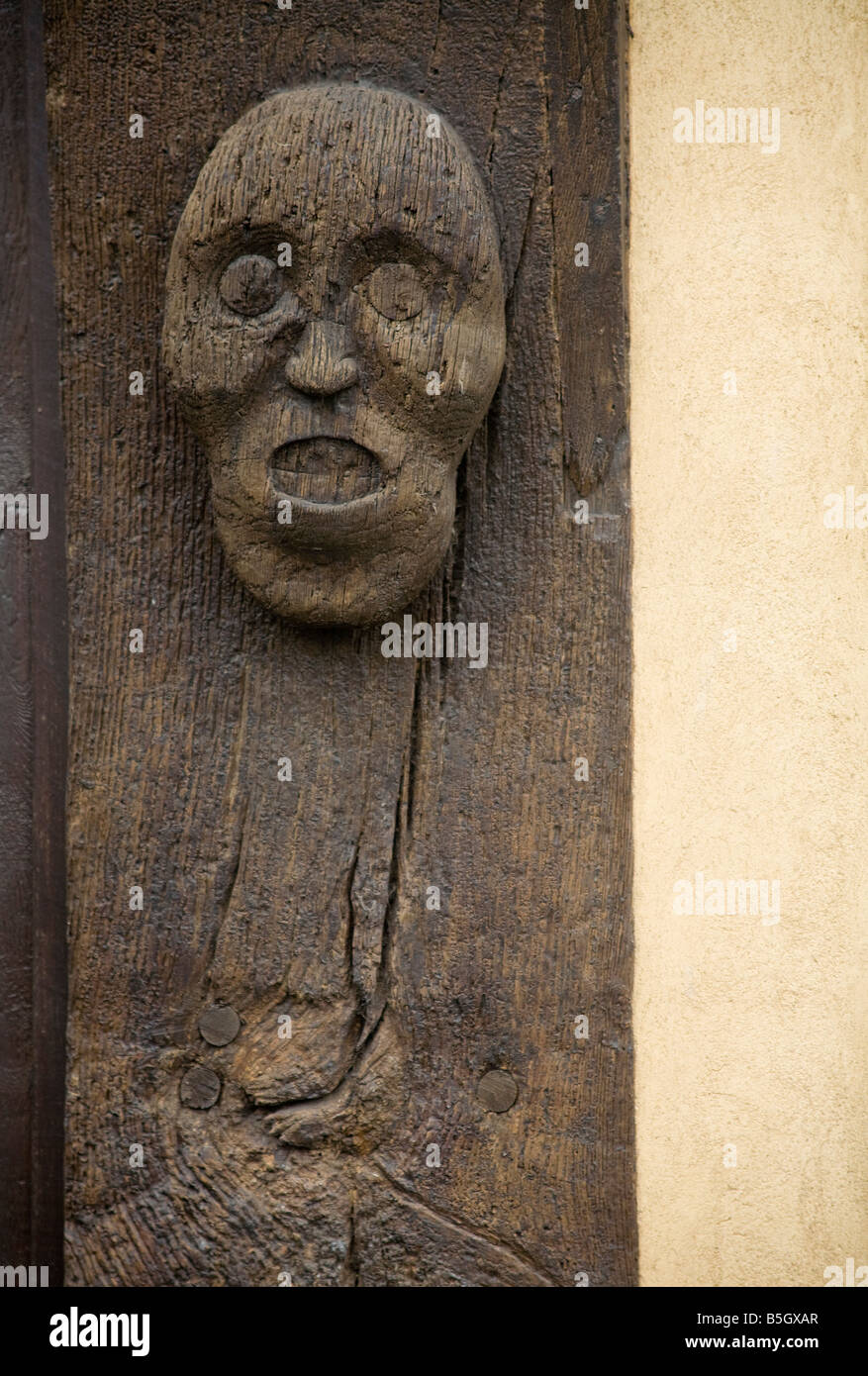 mask on timber framed house Stock Photo - Alamy