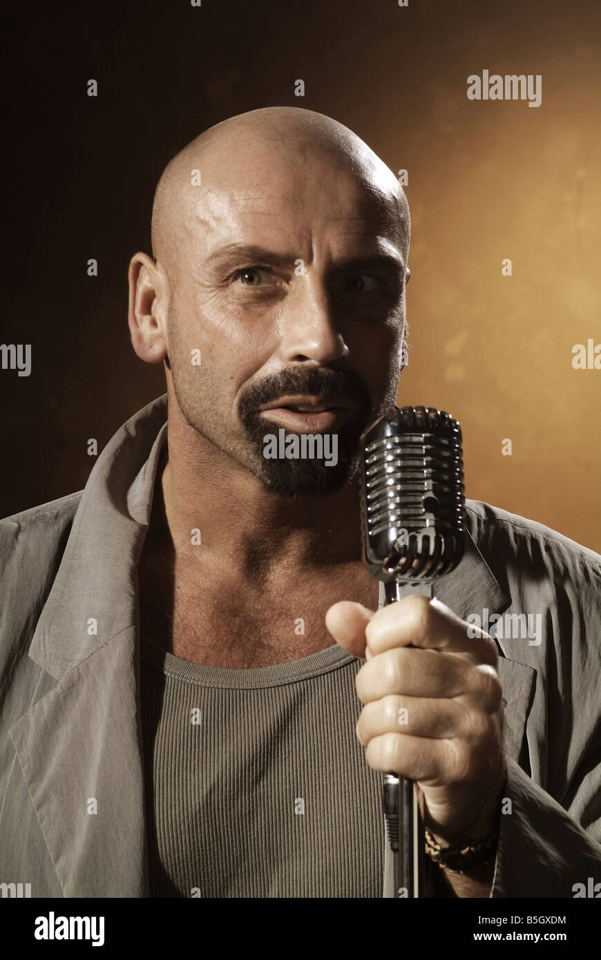 Man with a microphone Stock Photo - Alamy