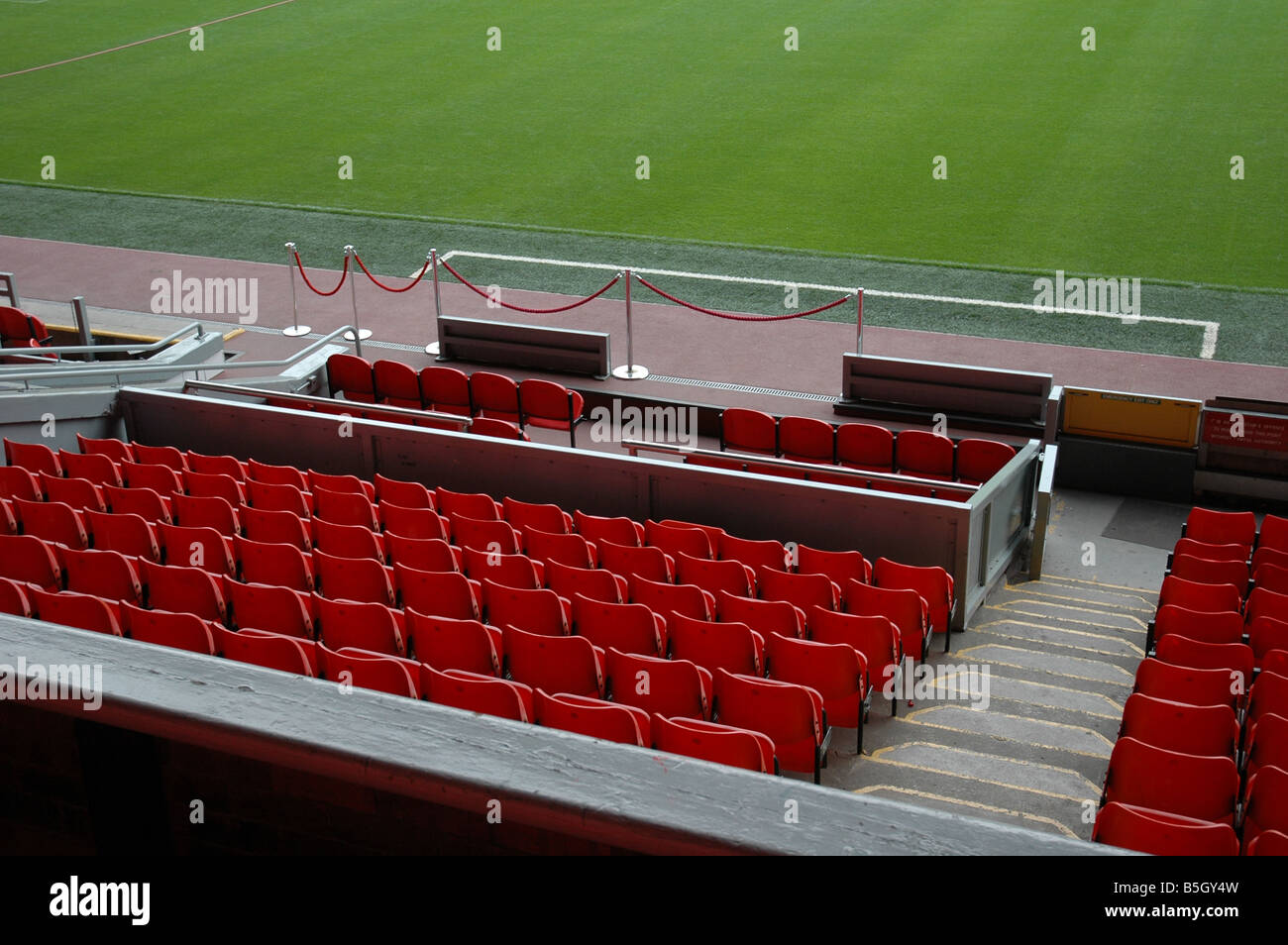 Seats at Anfield here is the area where the players and managers sit ...