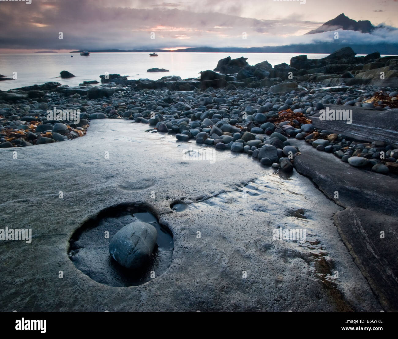 Incredible eroded limestone sheets and pebbles on Elgol beach, with the ...