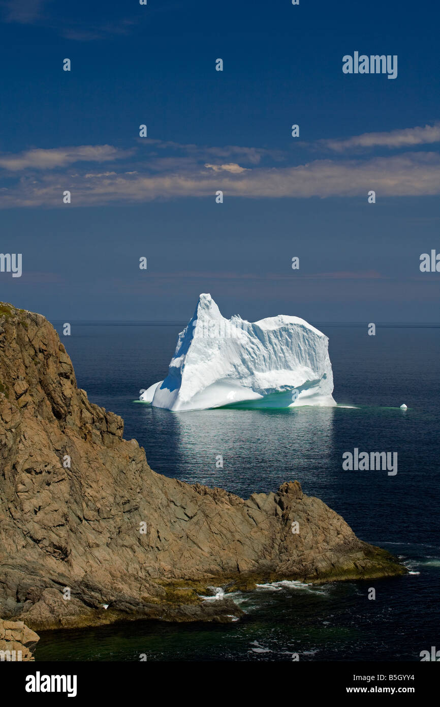 iceberg and cliffs, Twillingate, Newfoundland&Labrador, Canada Stock ...