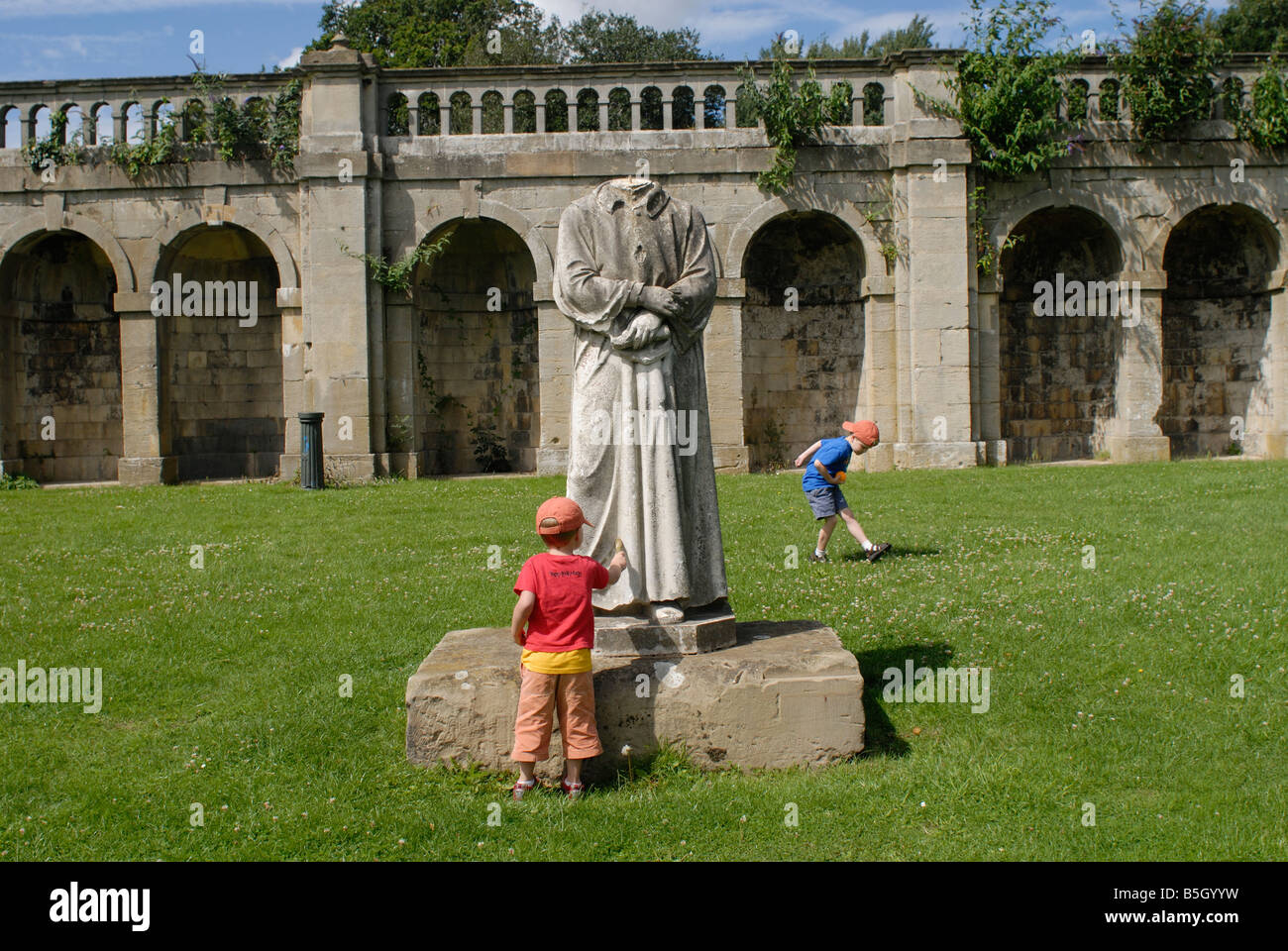Child Touching Statue High Resolution Stock Photography and Images - Alamy