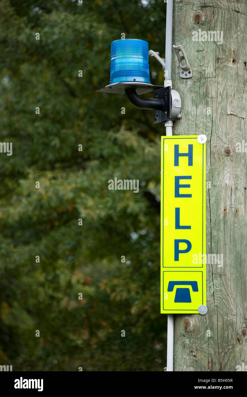 Help sign on a pole to indicate the location of an emergency telephone ...
