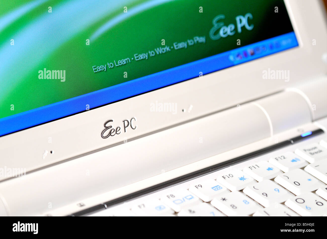 ASUS Eee PC closeup showing partial keyboard and screen Stock Photo - Alamy