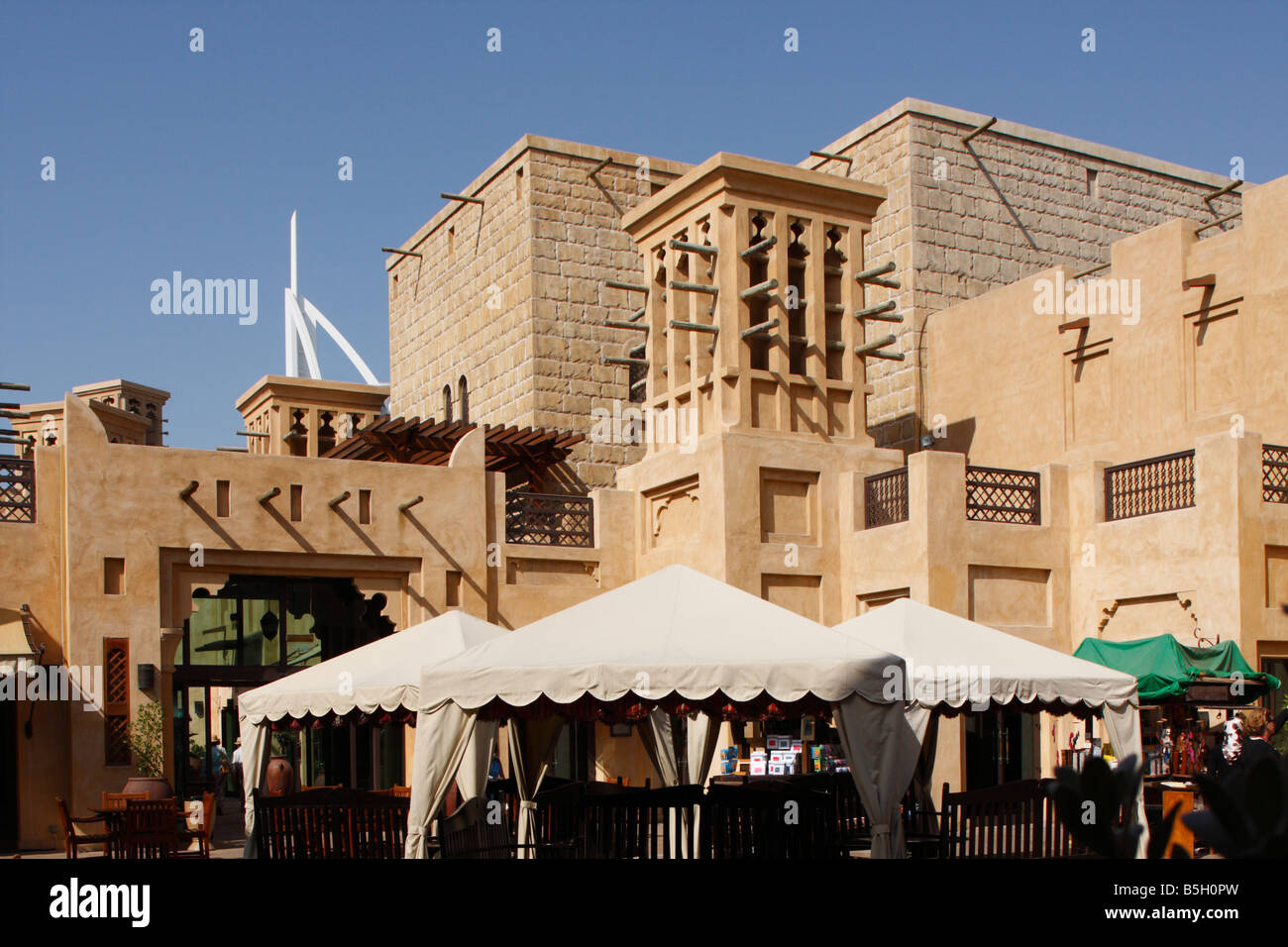 TRADITIONAL ARCHITECTURE DESIGNS AND WIND TOWERS IN DUBAI Stock Photo ...