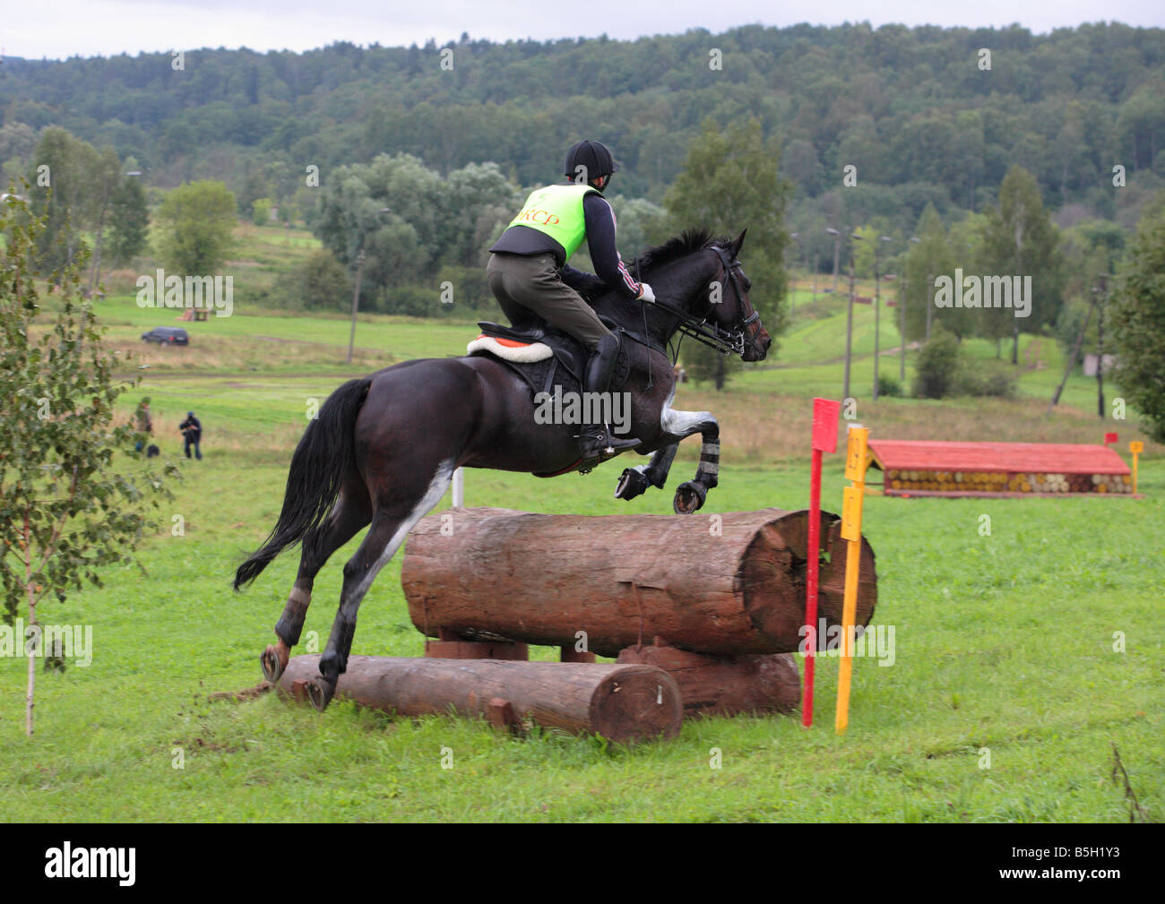 Horse and rider jumping an obstacle at a three day Eventing Competition ...
